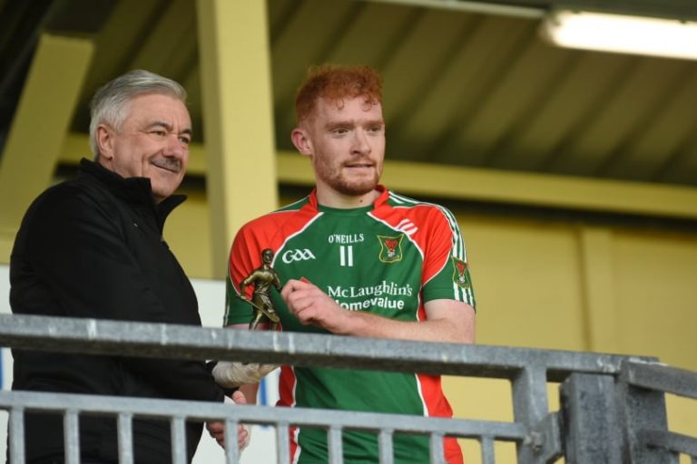 Man of the Match and Cathal Doherty and captain John O'Donnell gives ...